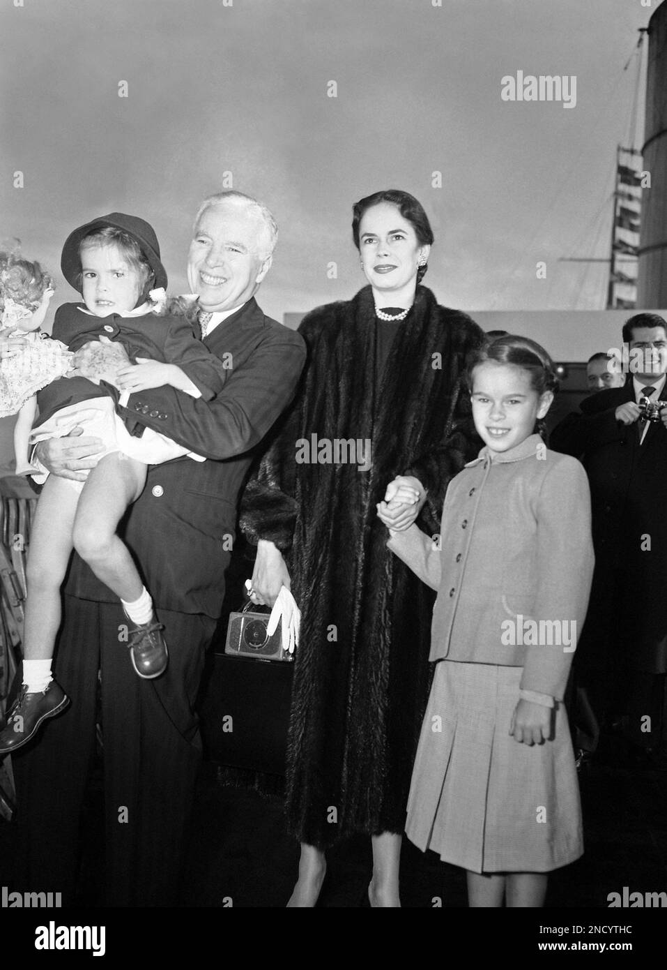 Charlie Chaplin holds his three-year-old daughter, Josephine, and his ...