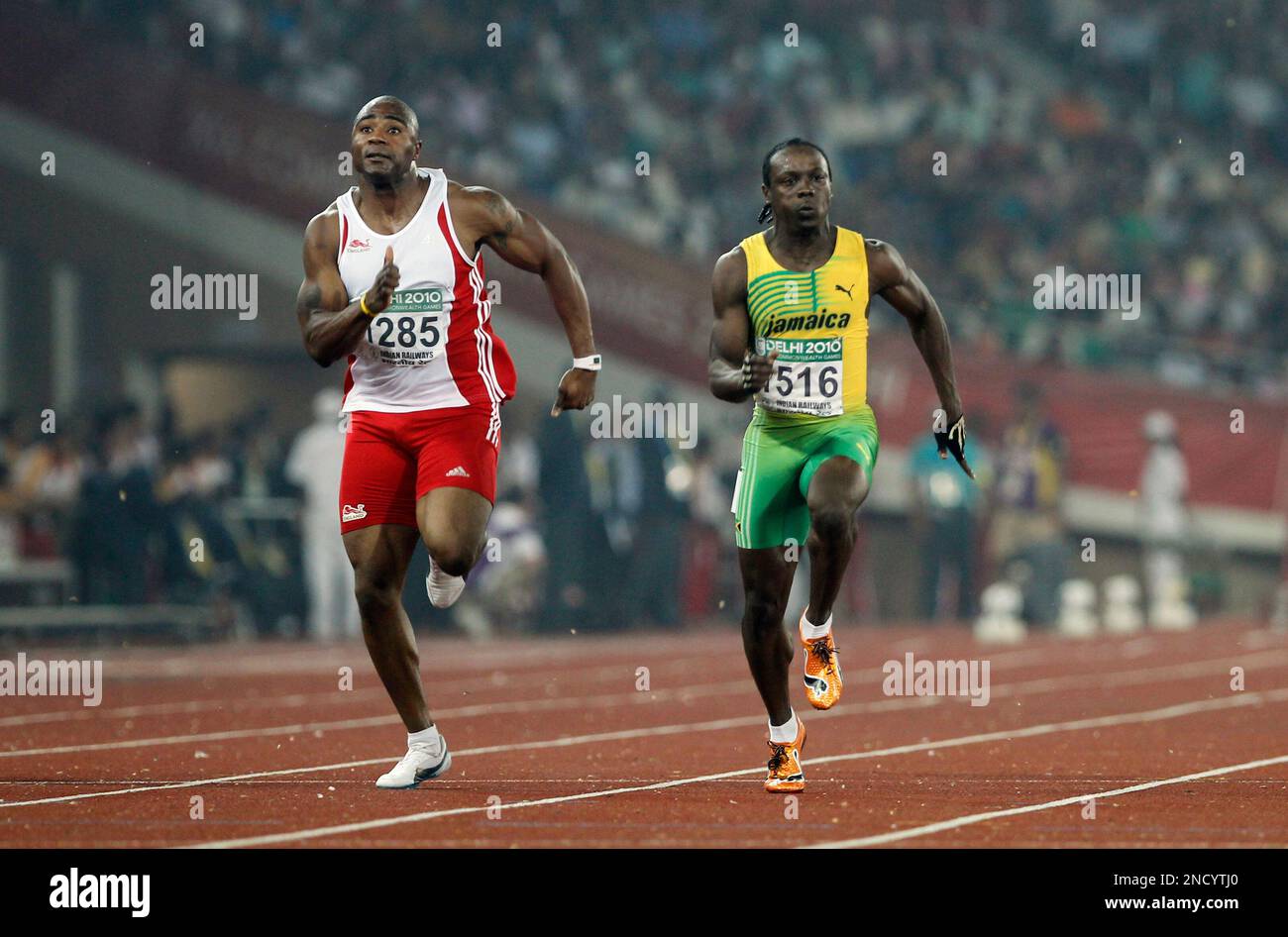 Jamaica's Lerone Clarke, right, and England's Mark Lewis-Francis, left ...