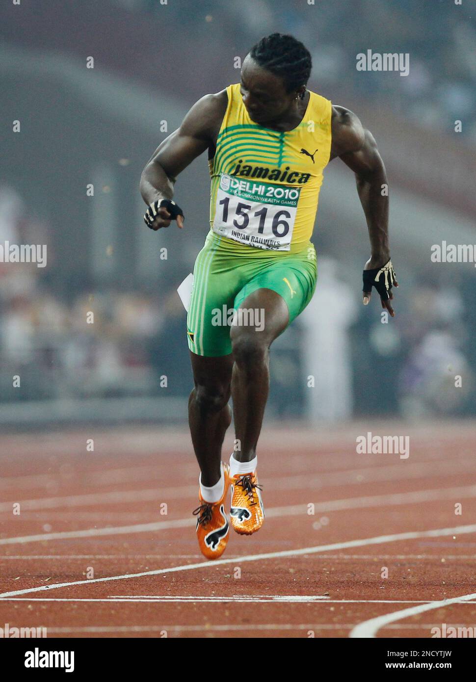 Jamaica's Lerone Clarke goes to cross the finish line to win gold in ...