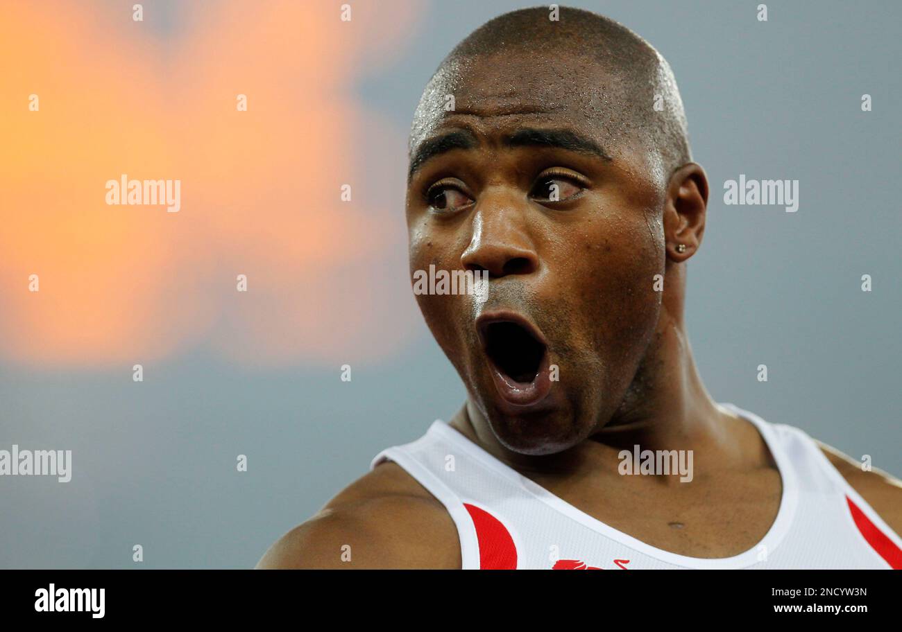 England's Mark Lewis-Francis reacts competing in a Men's 100m semifinal ...