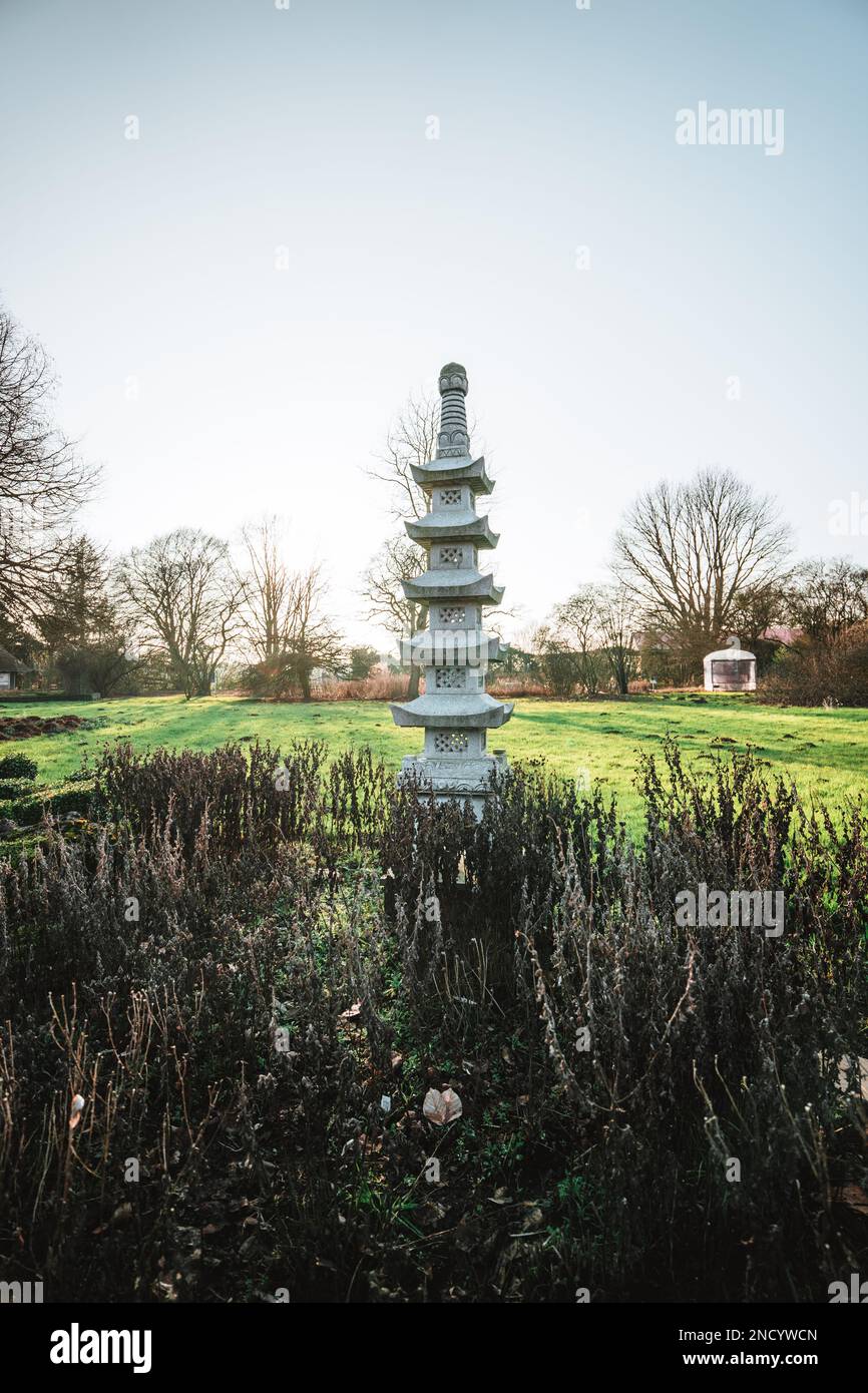 Japanese stone pagoda at a beautiful spring day Stock Photo - Alamy
