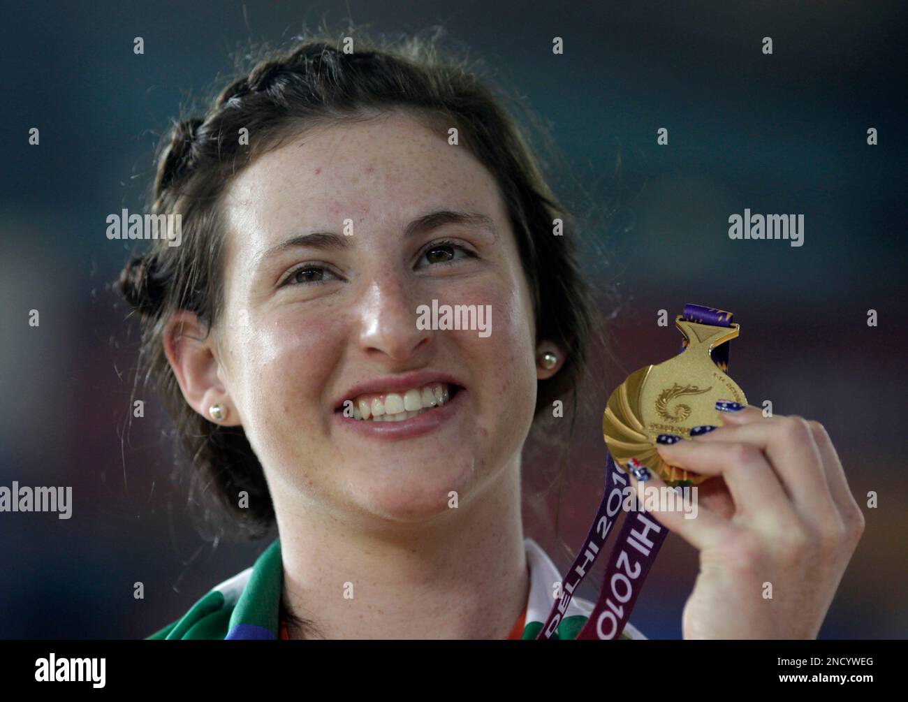 Australian cyclist Megan Dunn beams with the gold medal she won in the ...
