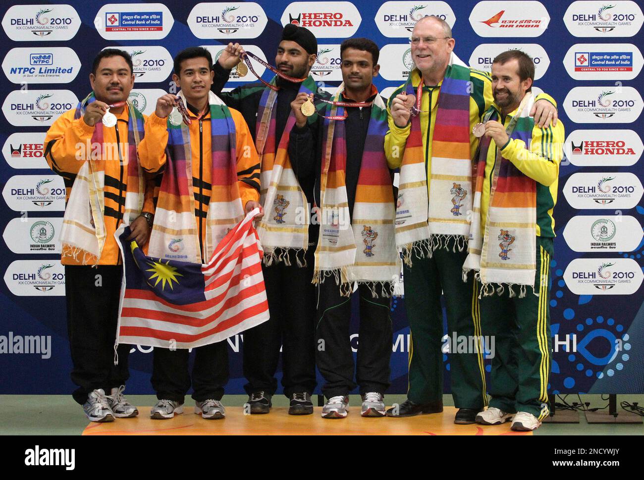 From left, Malaysia's silver winning pair Amir Hassan Hasli Izwan and ...