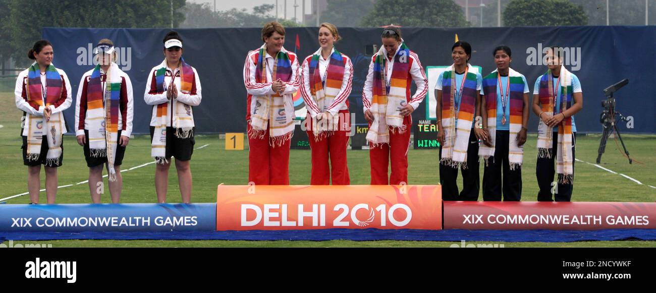 England's gold medal winners, center, of the women archery team ...