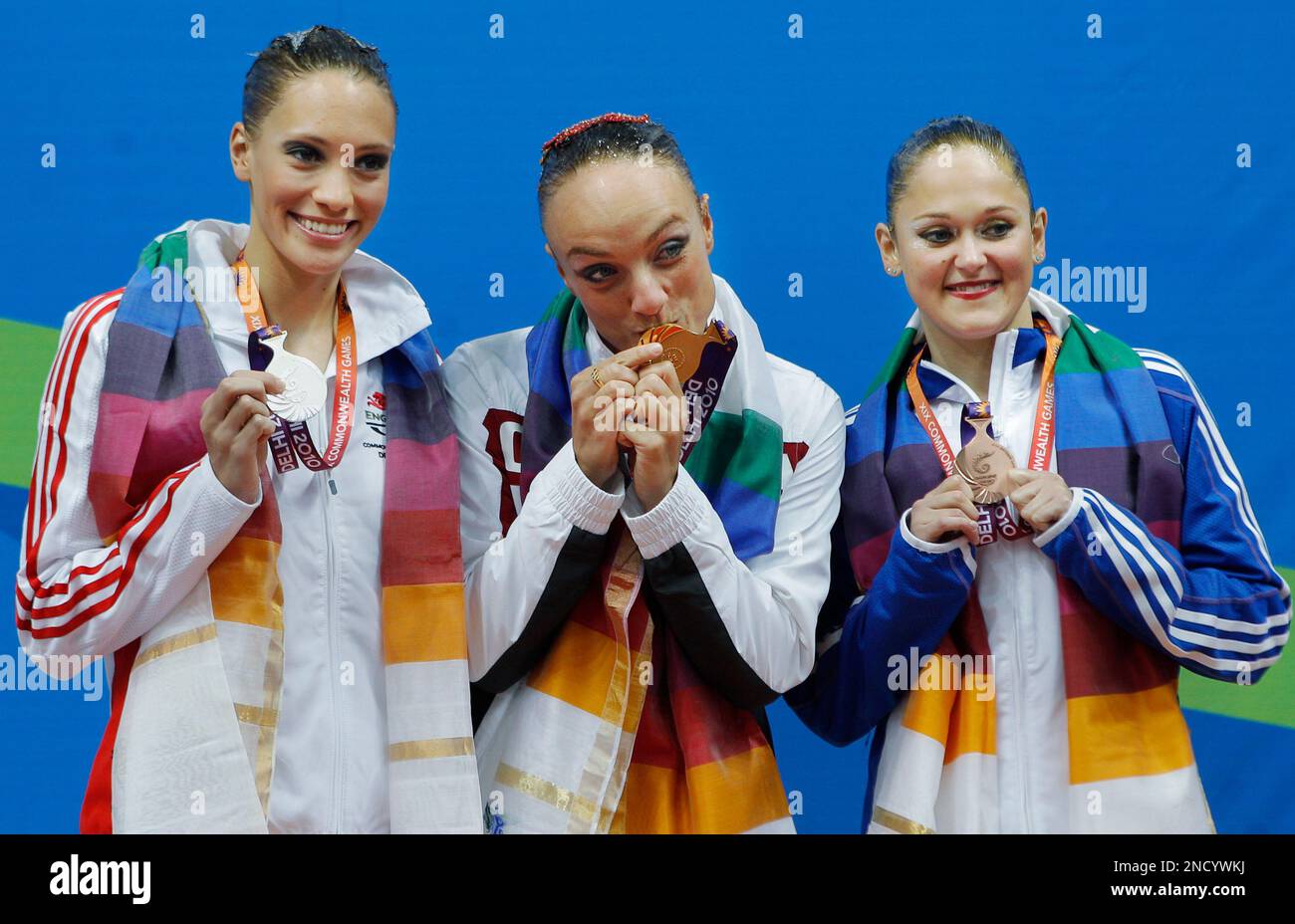 Canada's gold medalist Marie-Pier Boudreau-Gagnon, center, kisses her ...