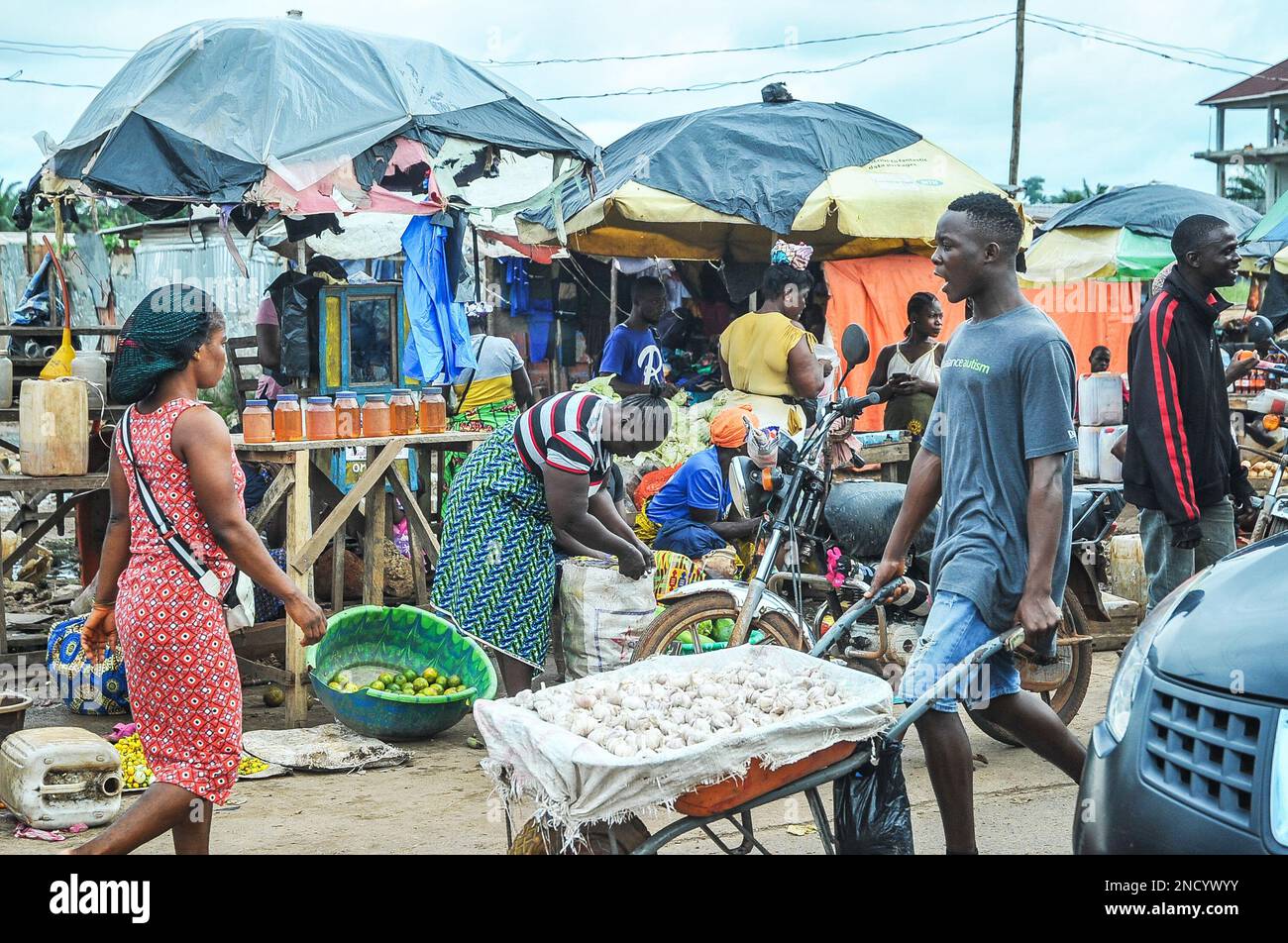 Buying and Selling on a busy Monrovia - Gbarnga Highway. The market is ...