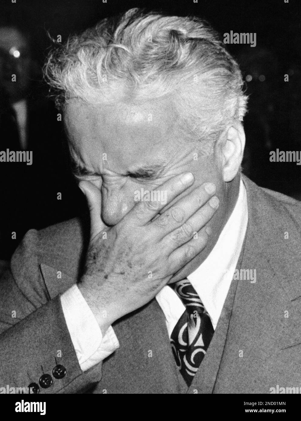Charlie Chaplin suppresses a yawn during his appearance in court in Los ...
