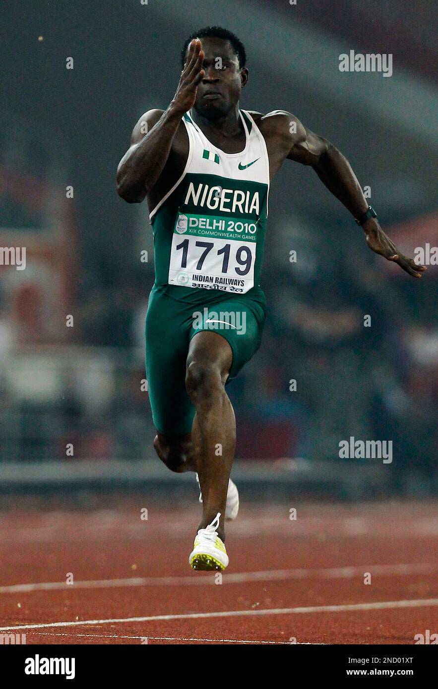 Nigeria's Egwero Oghoghene crosses the finish line in a Men's 100m heat ...