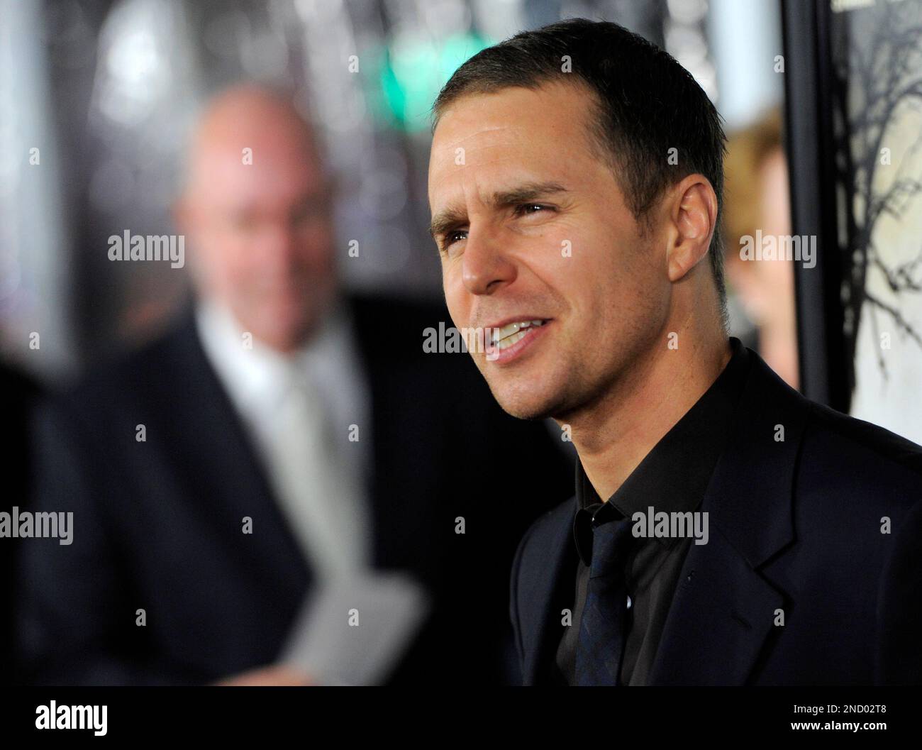 Sam Rockwell, a cast member in "Conviction," poses at the premiere of ...