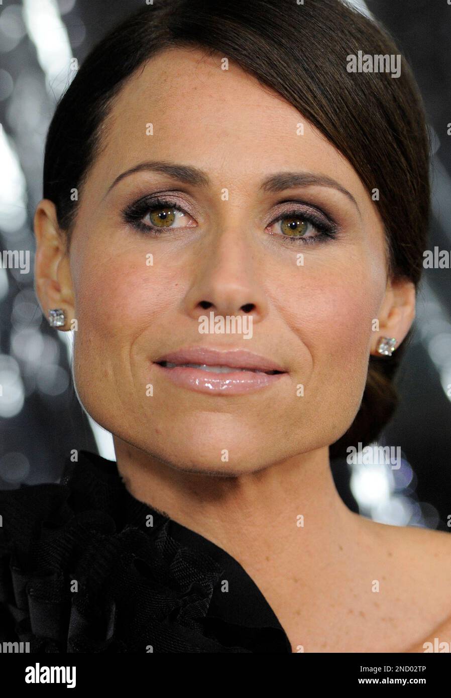 Minnie Driver, a cast member in "Conviction," poses at the premiere of ...