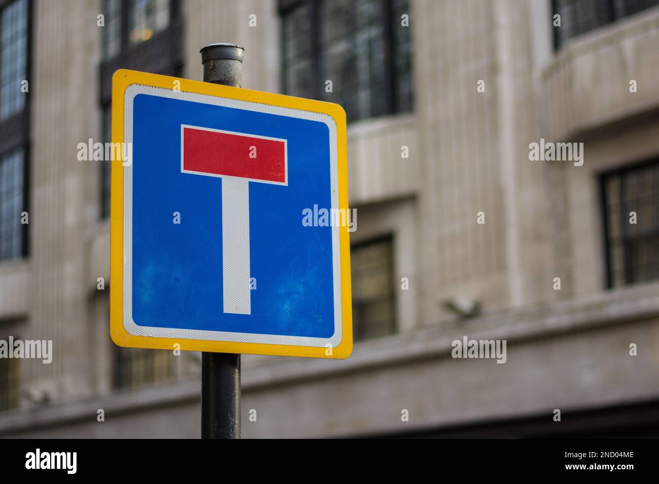 A road sign in the UK tells drivers the road ahead has a dead end and ...