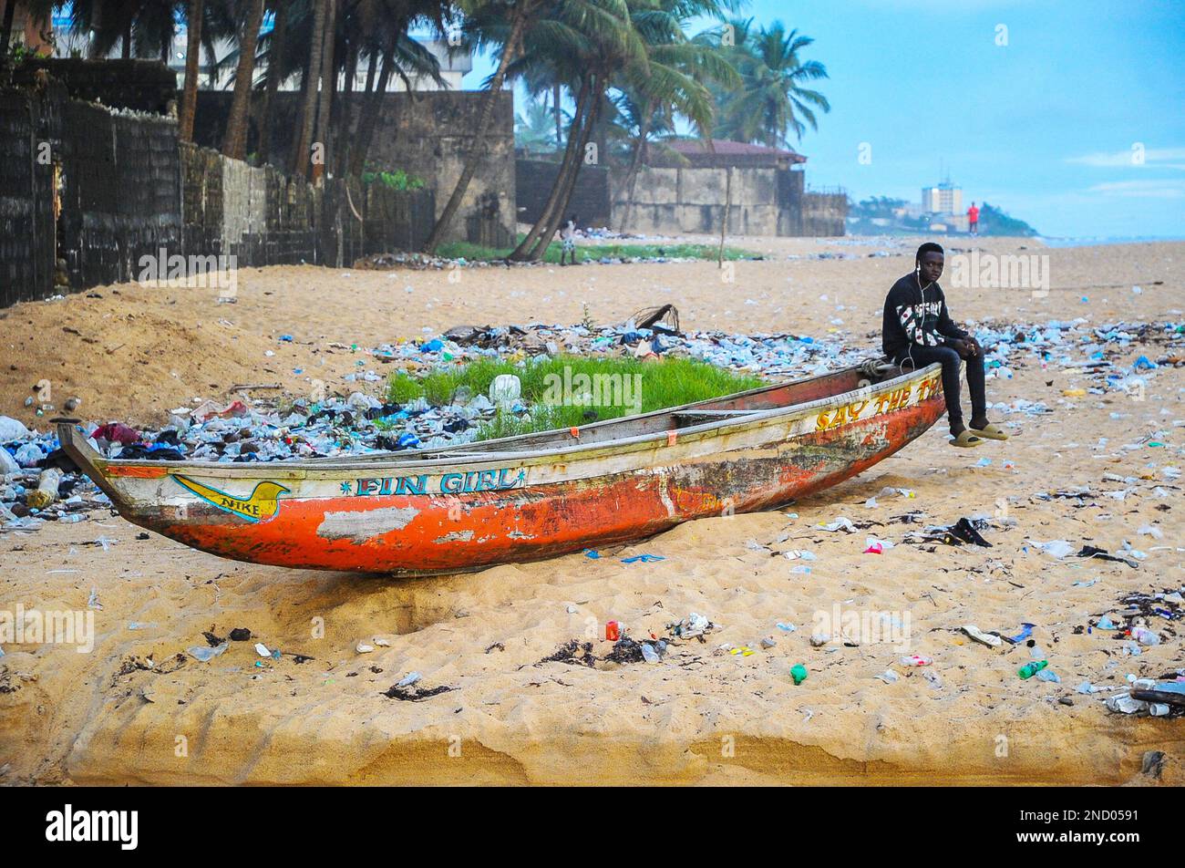 Dugout canoe on the Mamba Point River. Mamba Point beach is the western ...
