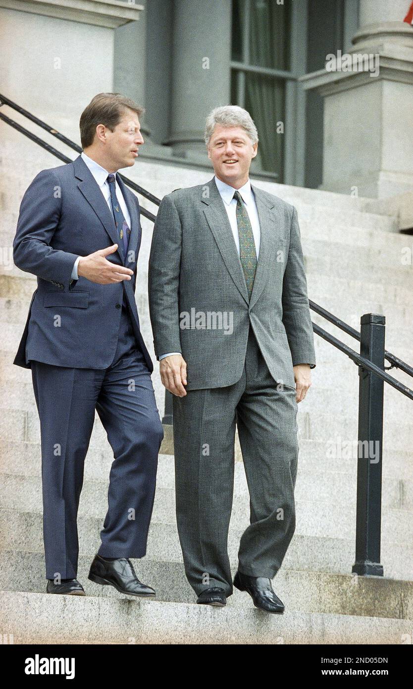 U.S. Vice President Al Gore speaks with President Bill Clinton as the ...