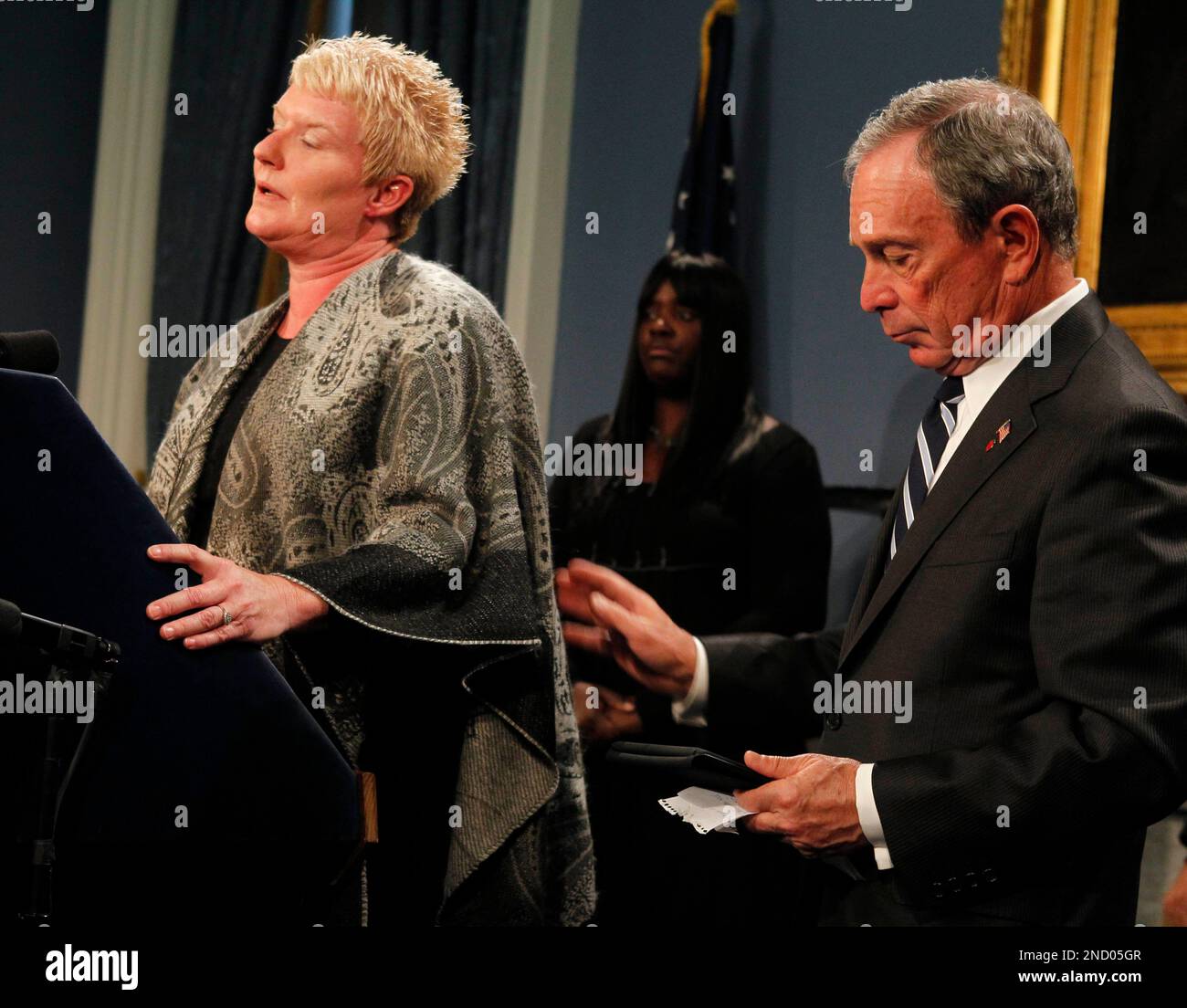 New York City Mayor Michael Bloomberg, right, comforts Jean Marie ...