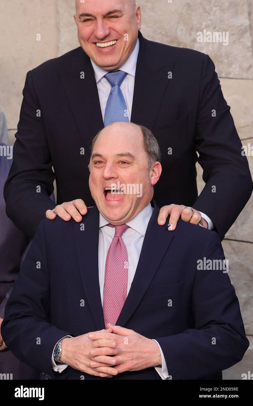 Italy's Defense Minister Guido Crosetto, top, jokes with British ...