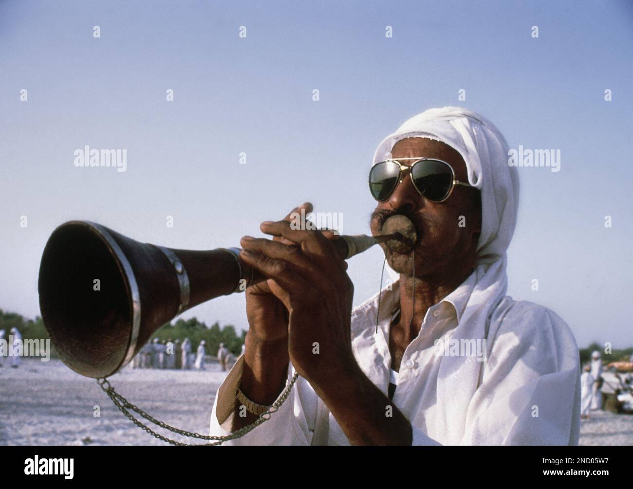 A local street musician performs during the Eid ul Fitr celebration ...