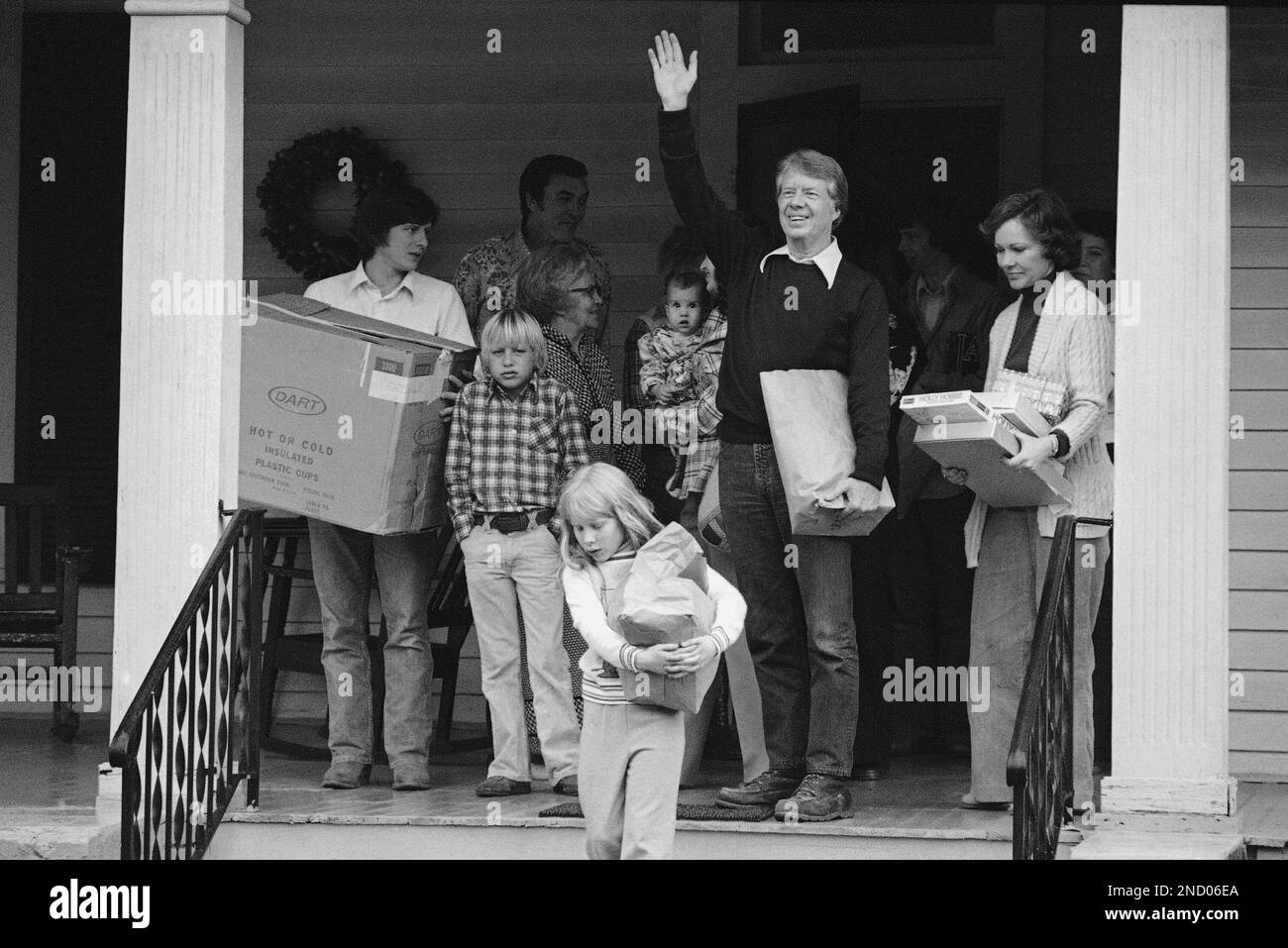 President Jimmy Carter waves to spectators during Christmas morning ...