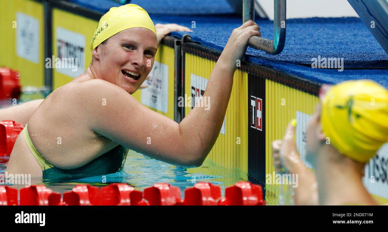 Australia's Leisel Jones, left, reacts after winning silver in the ...