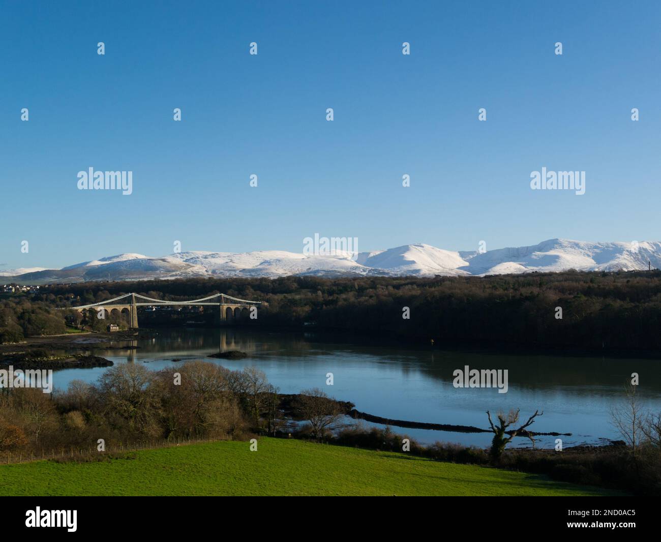View across Menai Strait Thomas Telford's Suspension Bridge towards ...