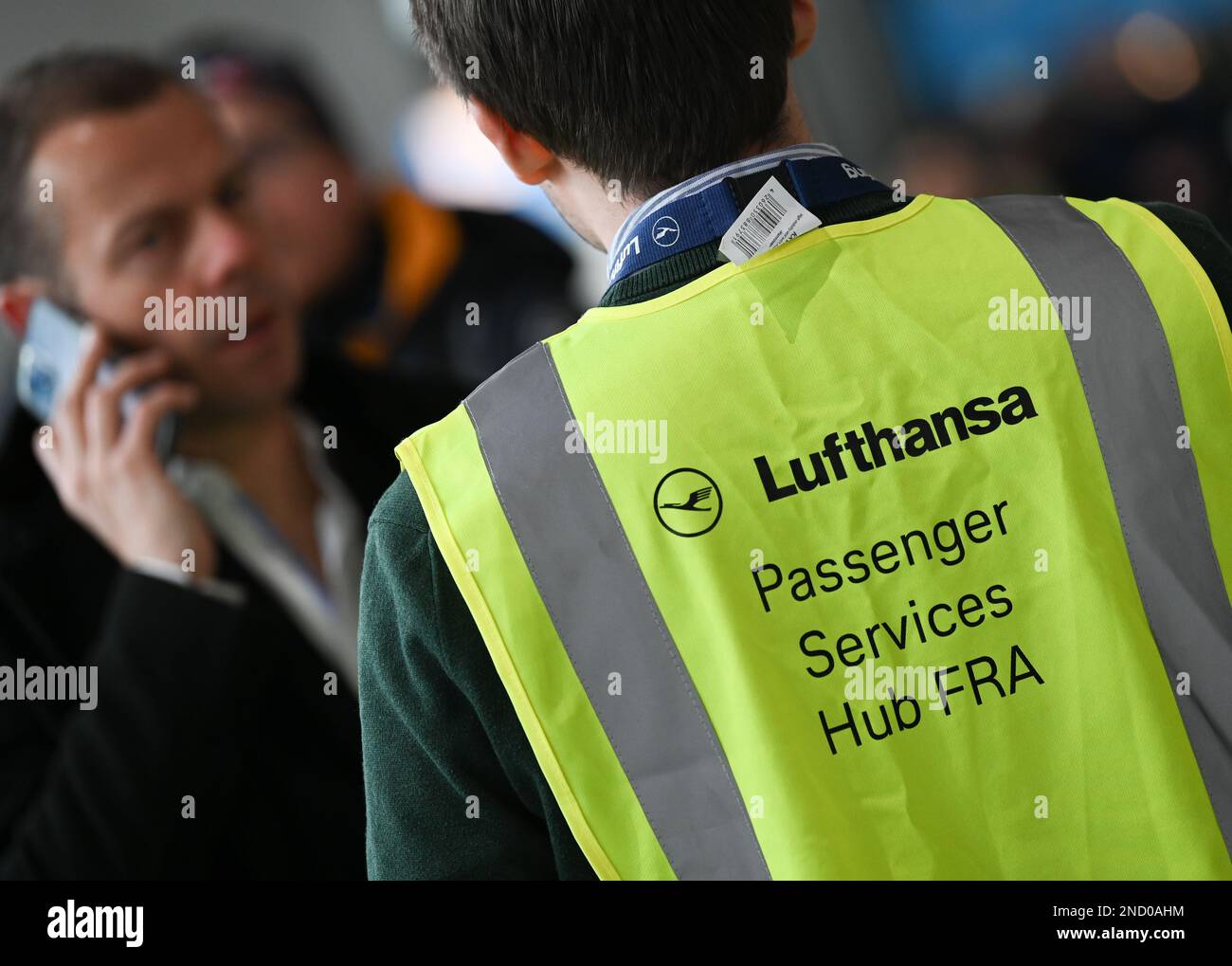 Hesse, Frankfurt/Main. 15th February 2023. A Lufthansa employee stands ...