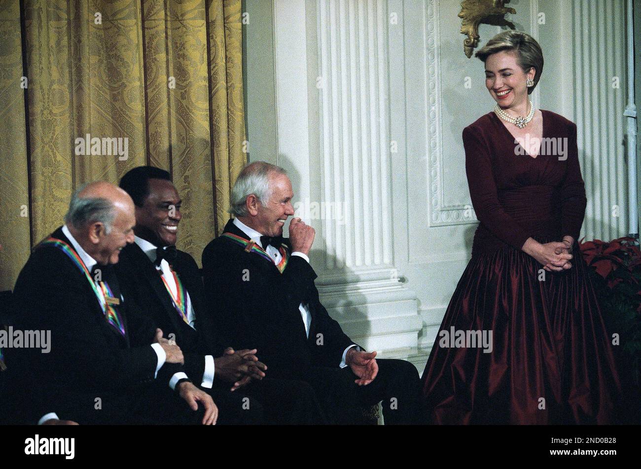 First lady Hillary Rodham Clinton laughs with conductor Georg Solti ...
