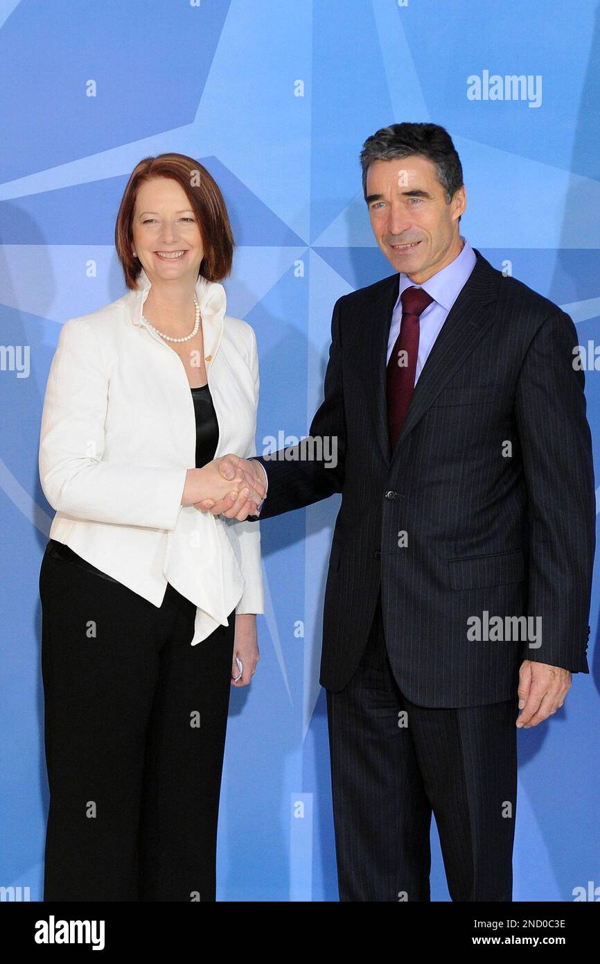NATO Secretary General Anders Fogh Rasmussen, left, welcomes Australia's Prime Minister Julia ...