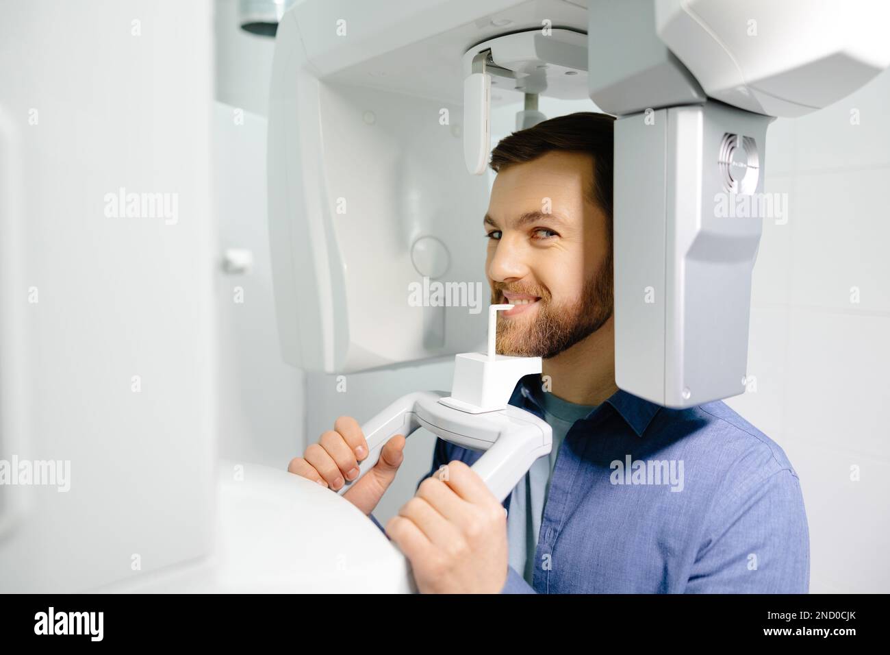 Panoramic image of teeth. A patient in a modern dental clinic takes a ...