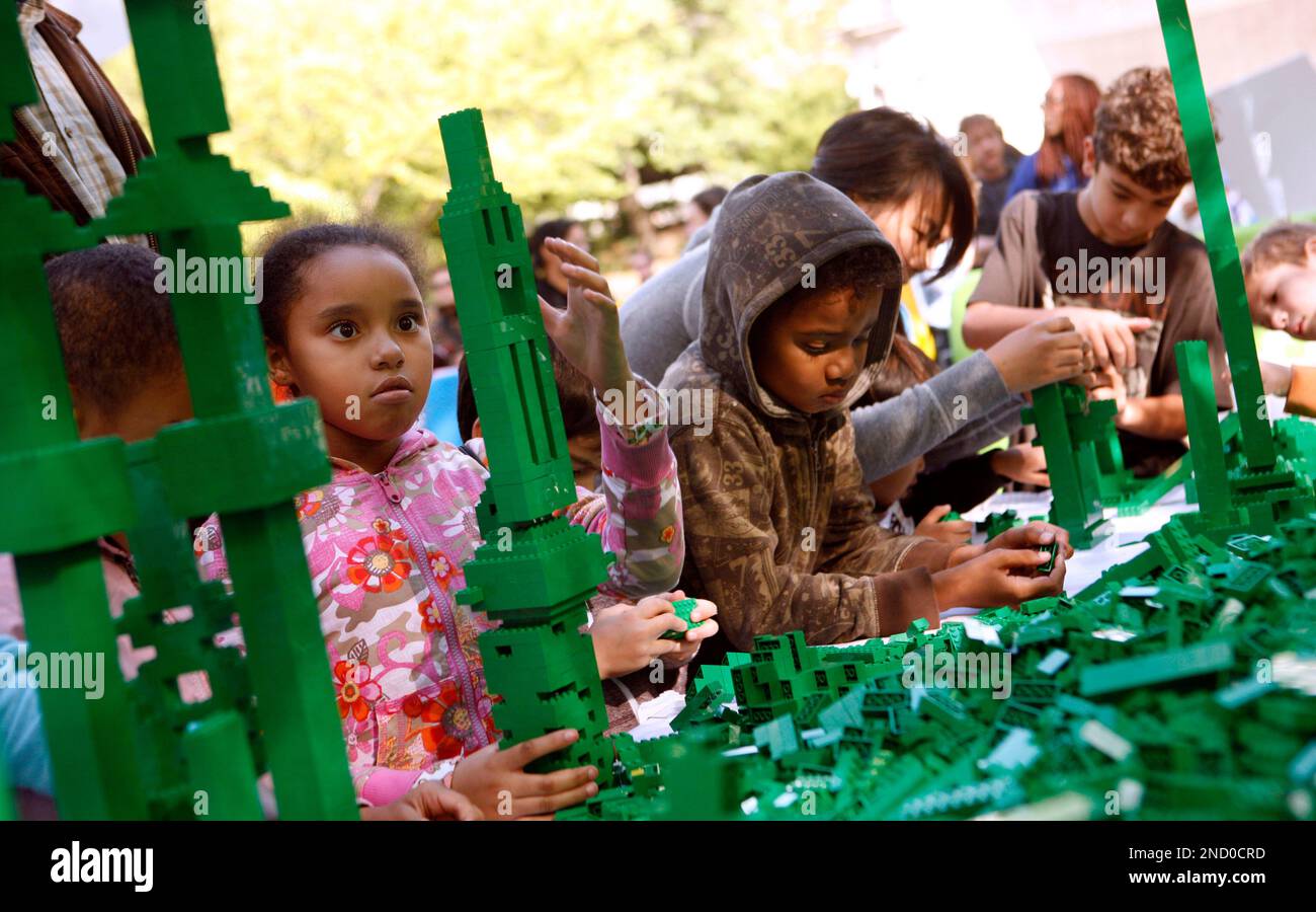 Families build a custom landscape from a sea of half a million green ...
