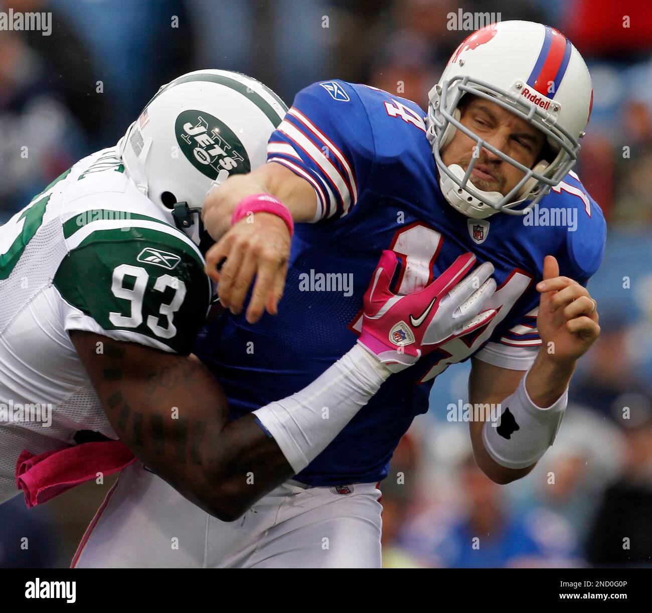 New York Jets defender Matt Kroul (93) hits Buffalo Bills quarterback ...