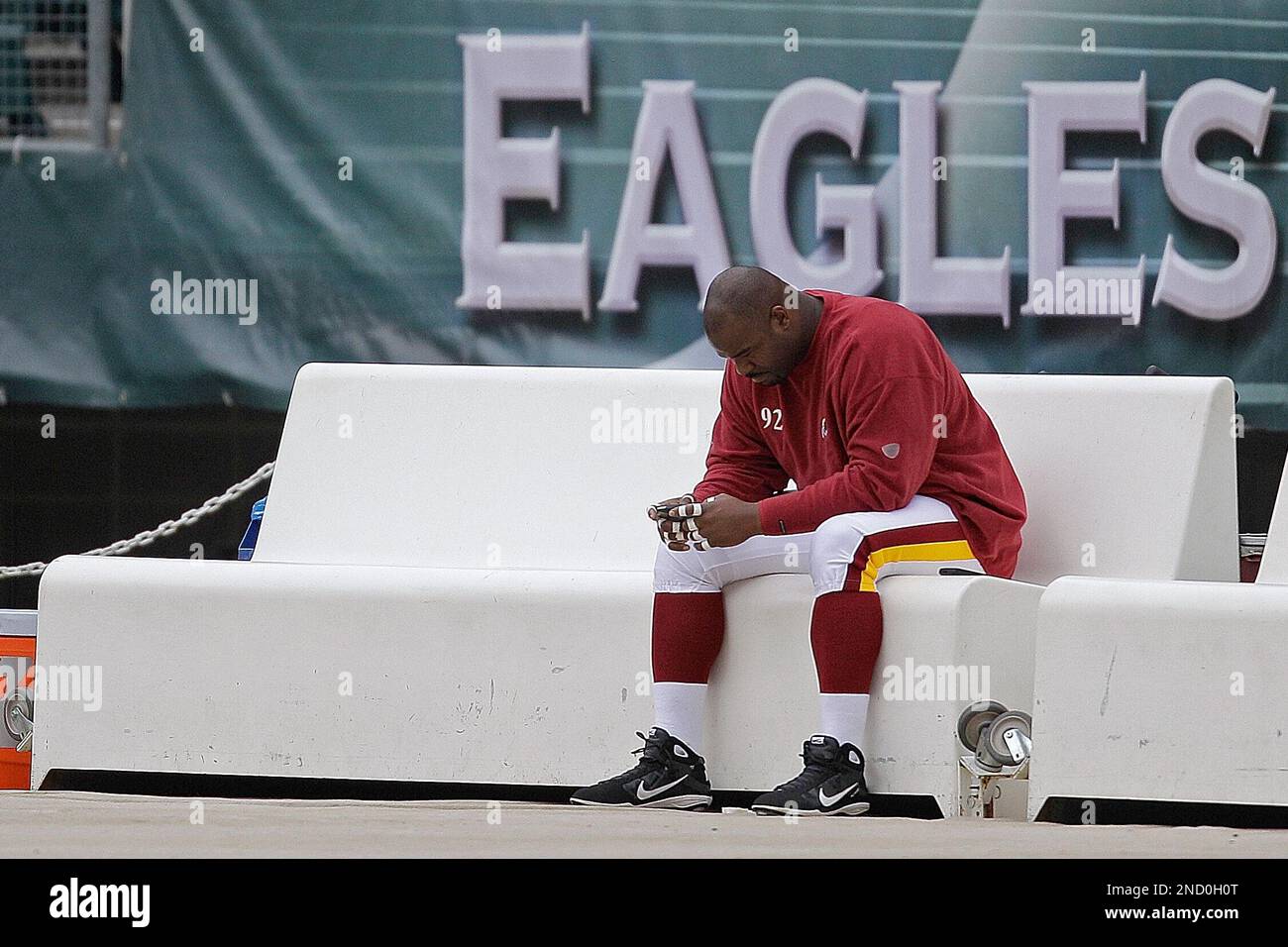 Washington Redskins defensive tackle Albert Haynesworth sits on the ...