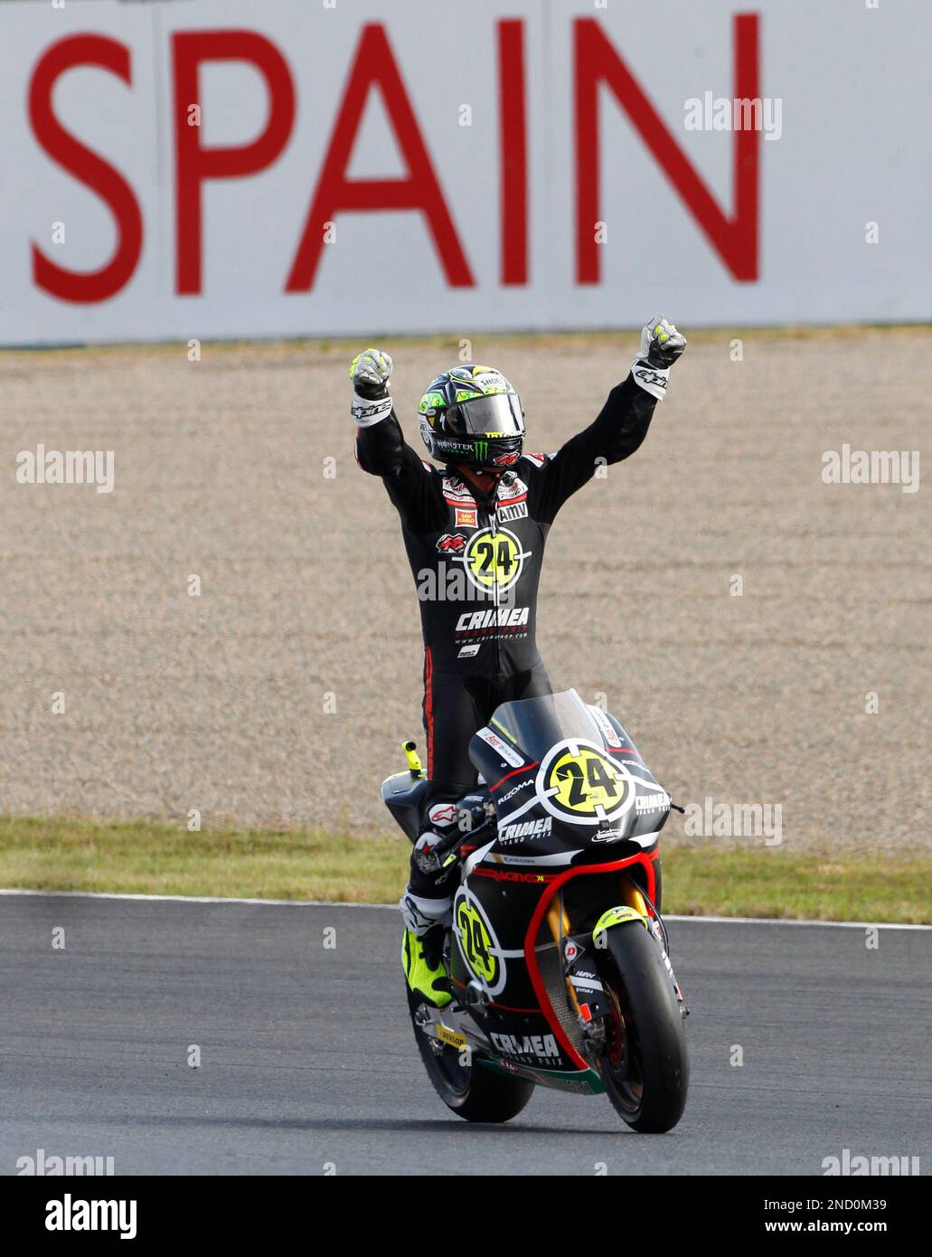 Spanish Moto2 rider Toni Elias steers his Moriwaki celebrates after ...