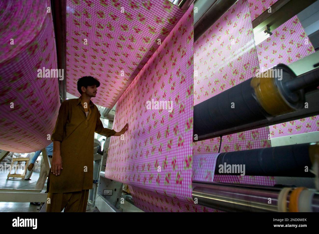 In this picture taken on Sept. 28, 2010, Pakistani worker Aqeel Ahmed ...