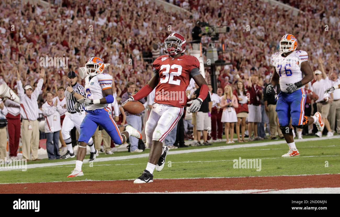 Alabama's C.J. Mosley (32) runs into the end zone on a second-half ...