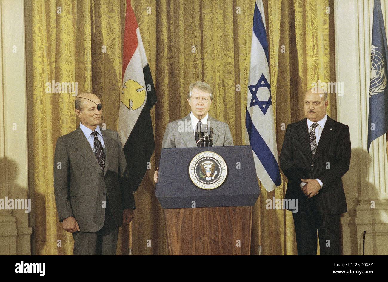 President Jimmy Carter, Israeli Foreign Minister Moshe Dayan and ...
