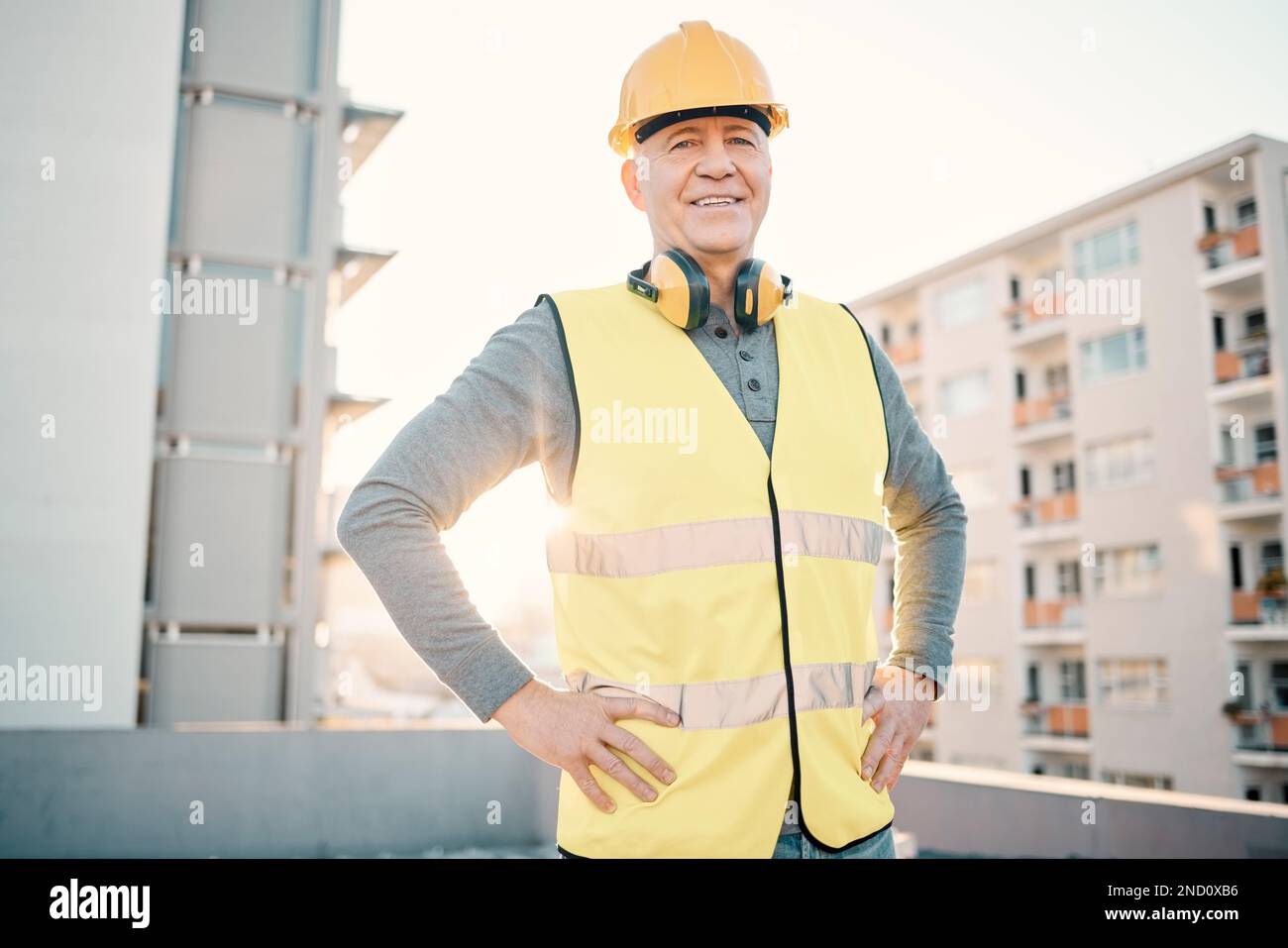 Construction worker, old man in portrait and architecture, renovation ...