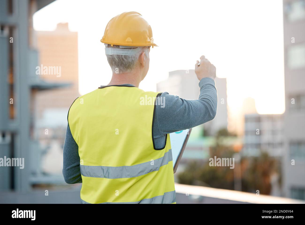 Building, construction and senior man with vision, planning and ...