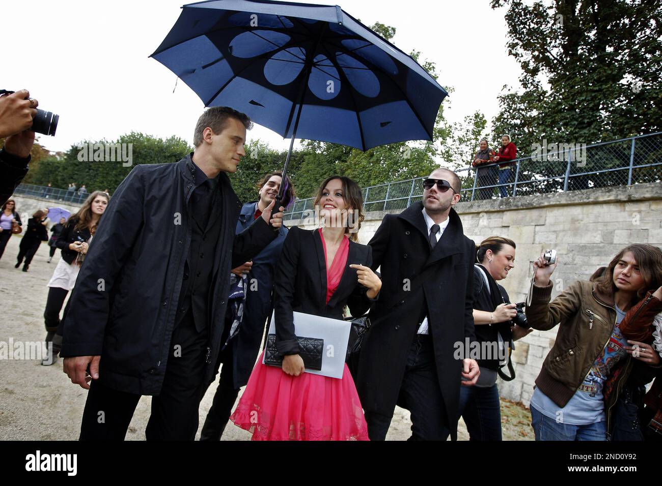 U.S. actress Rachel Bilson, center, leaves the British fashion designer ...