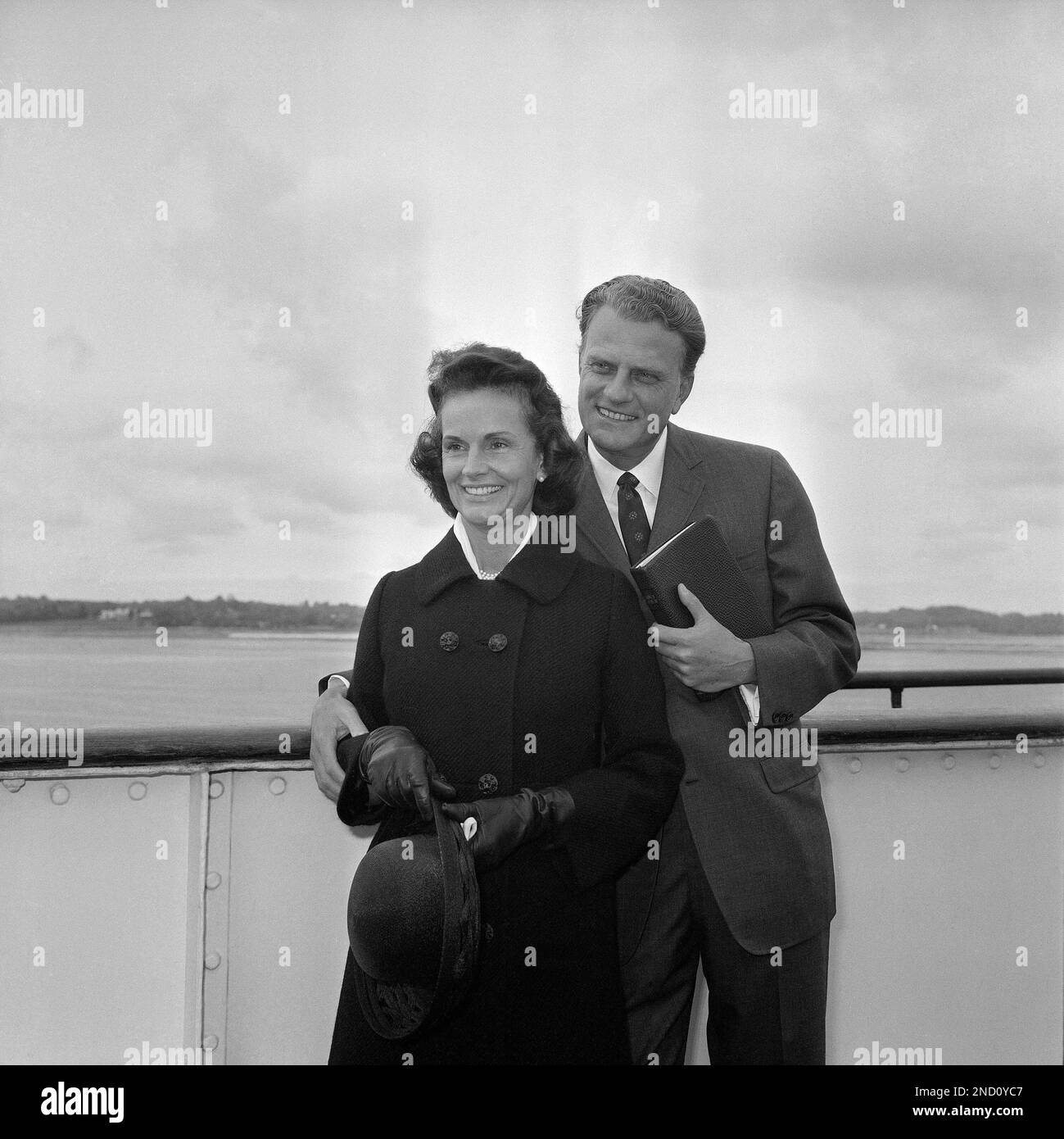 Evangelist Billy Graham and his wife, Ruth, pose on the liner “Queen ...