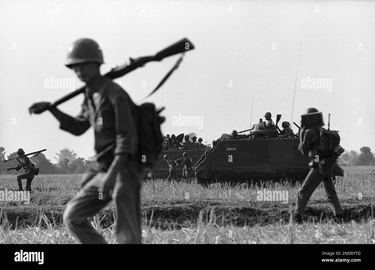 Members of two Vietnamese infantry battalions chasing Viet Cong ...
