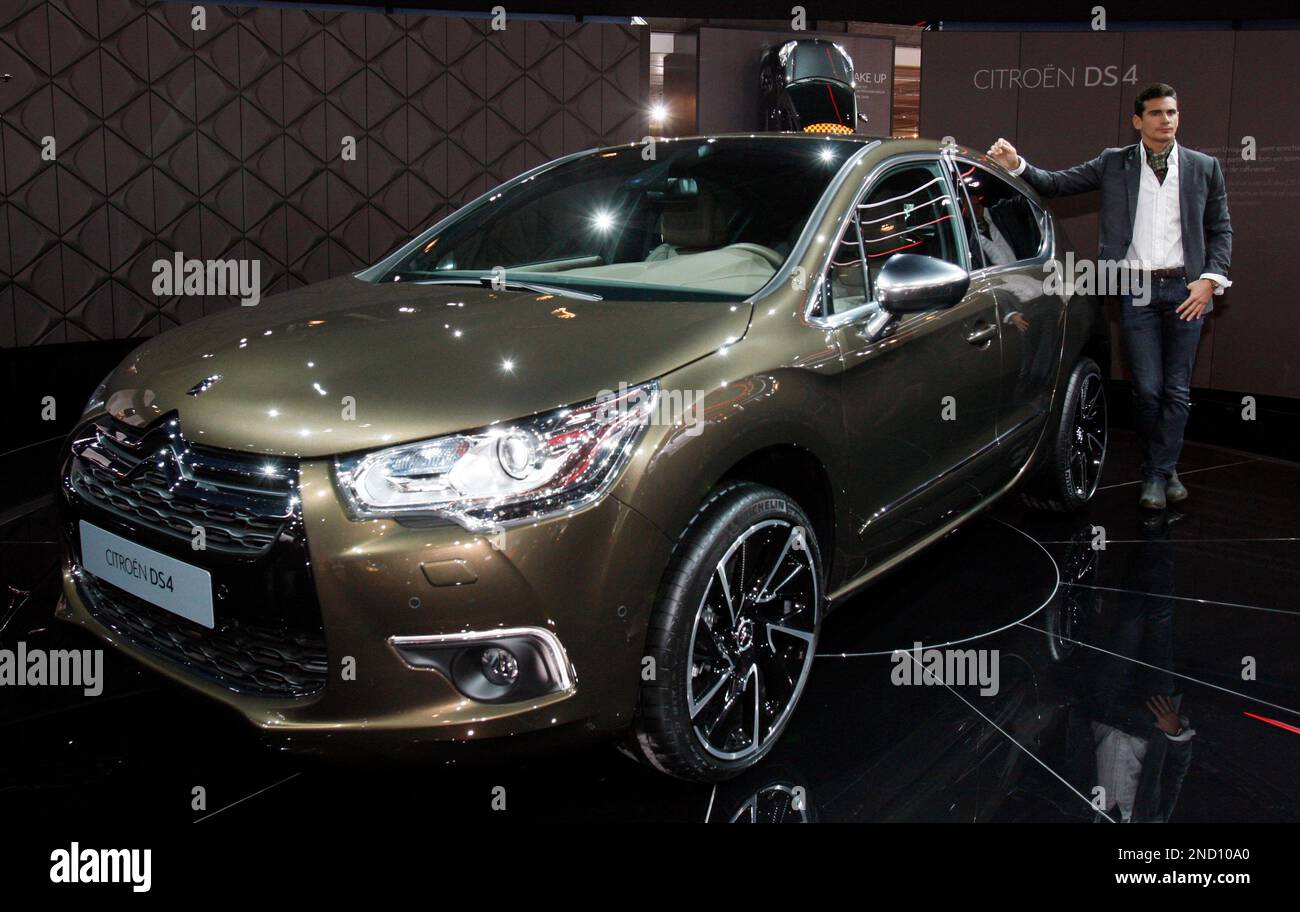 A models stands at the new Citroen DS4 during a press day of the Paris ...