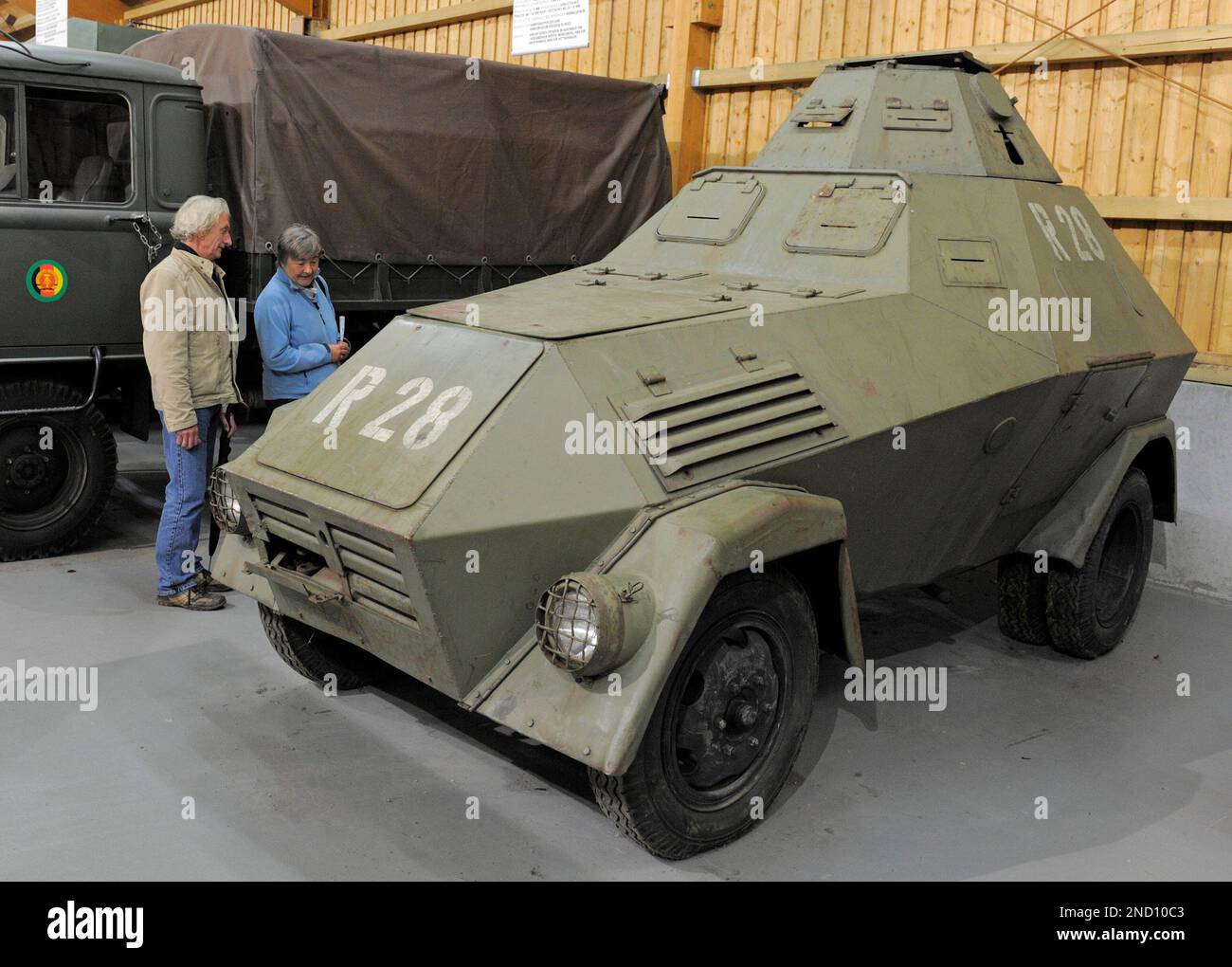 In this Wednesday, Sept. 29, 2010 photo, visitors stand besides a GDR ...