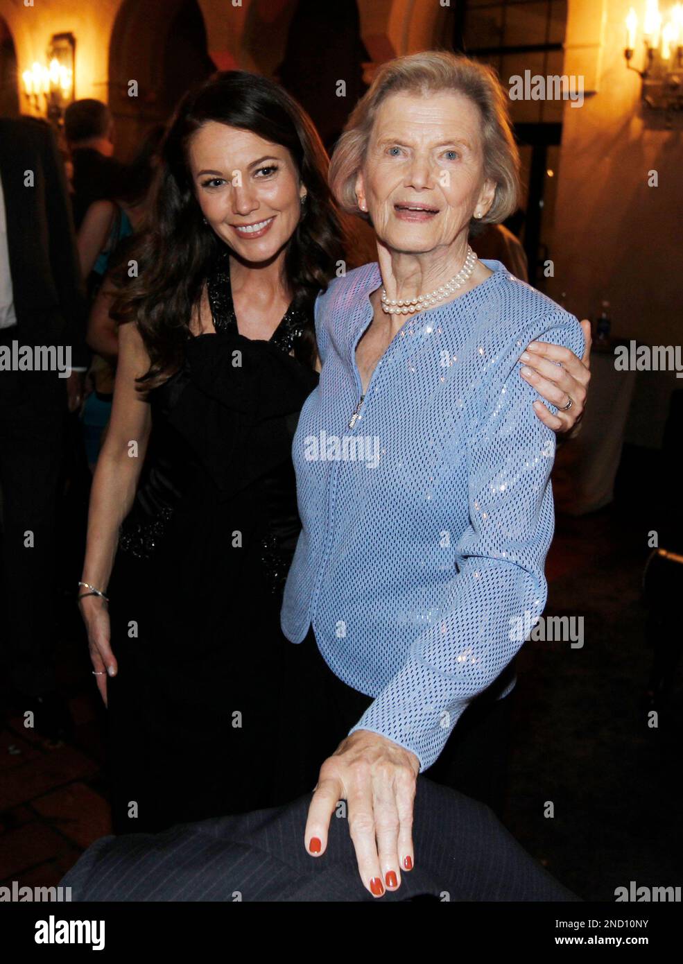 Diane Lane, left, and Penny Cherney pose together at the after party ...