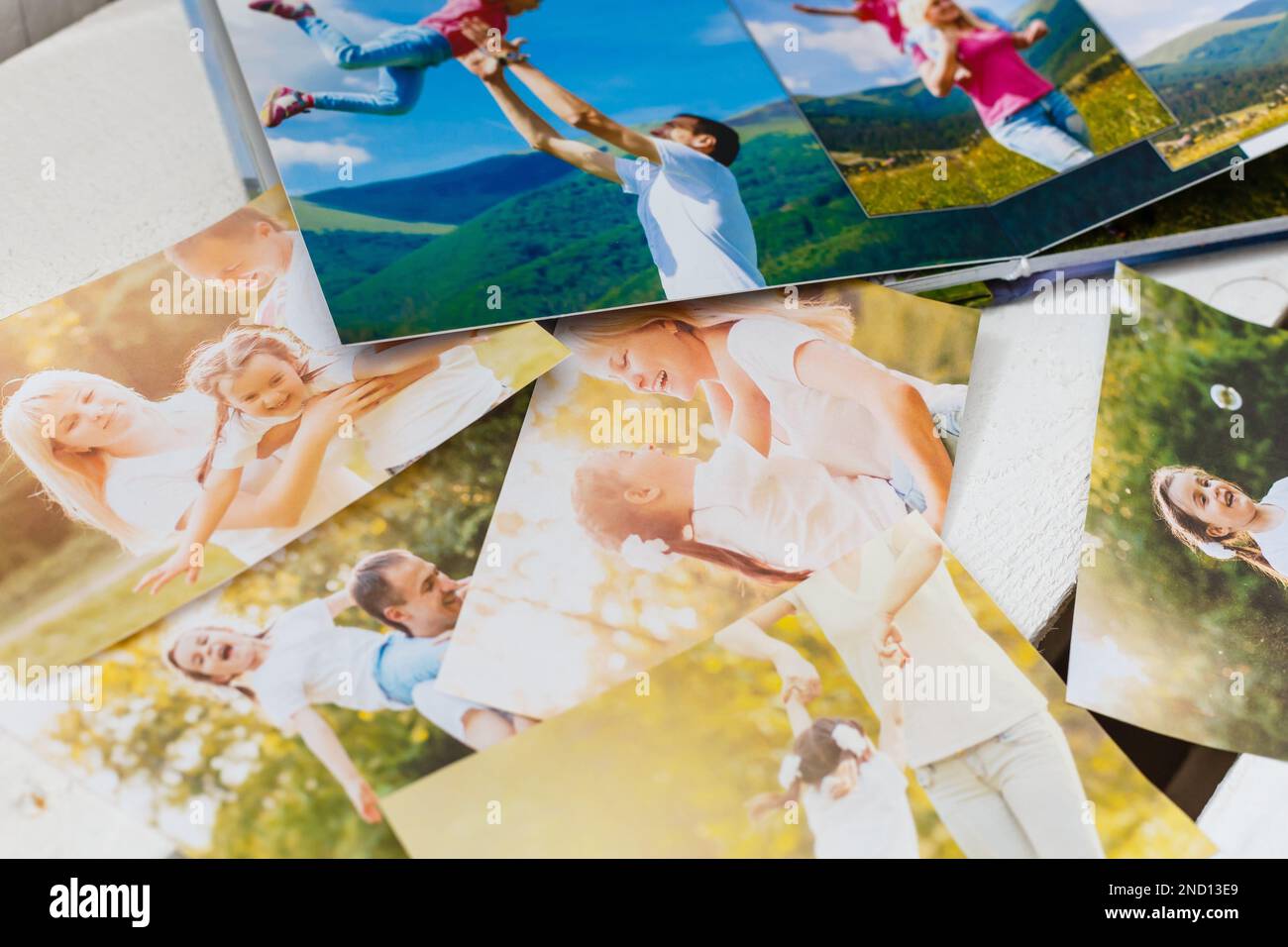 Family photos archive saved in brightly designed photo book; bright ...