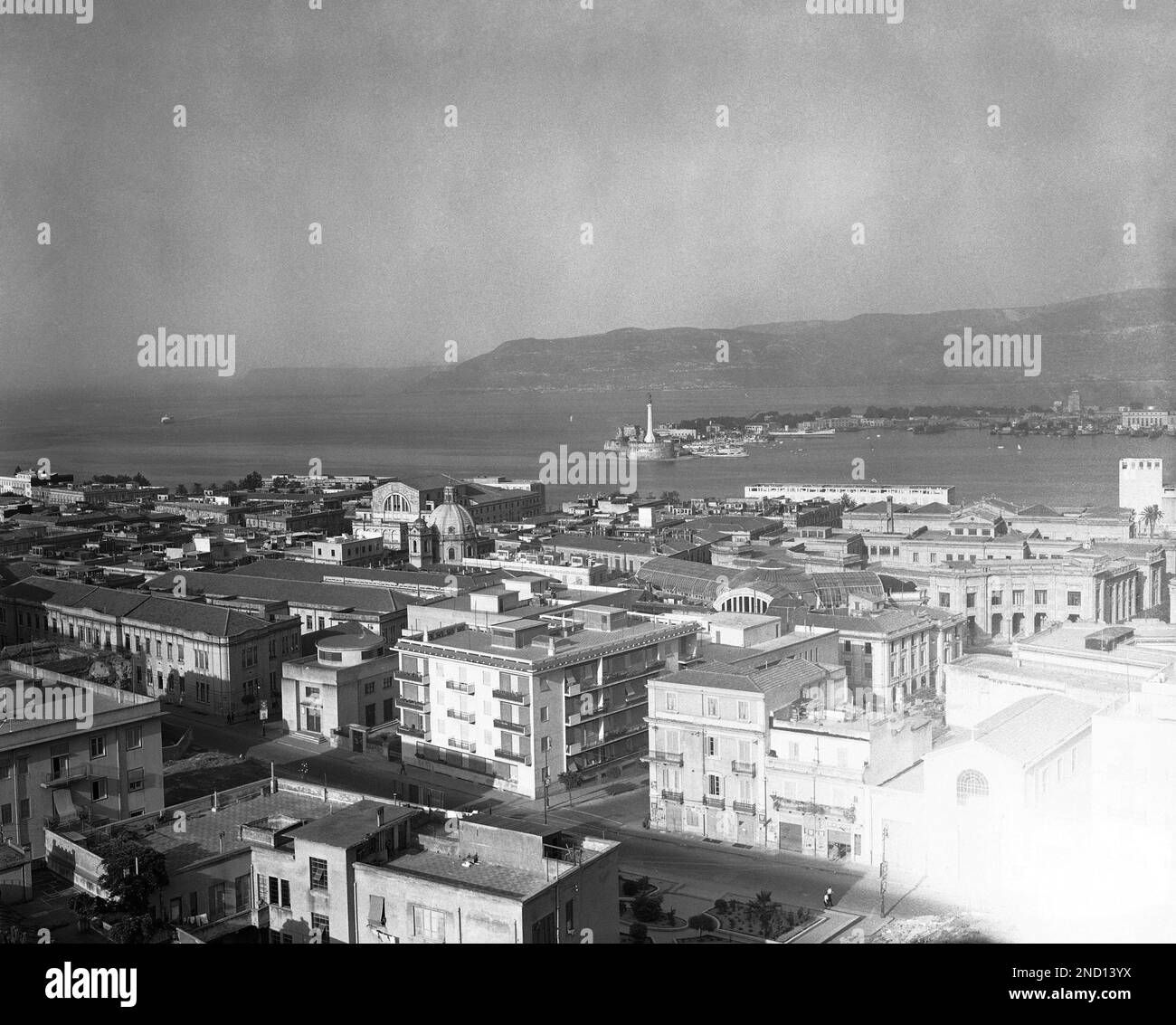 Messina and its harbor, showing, in the background, the strait with ...