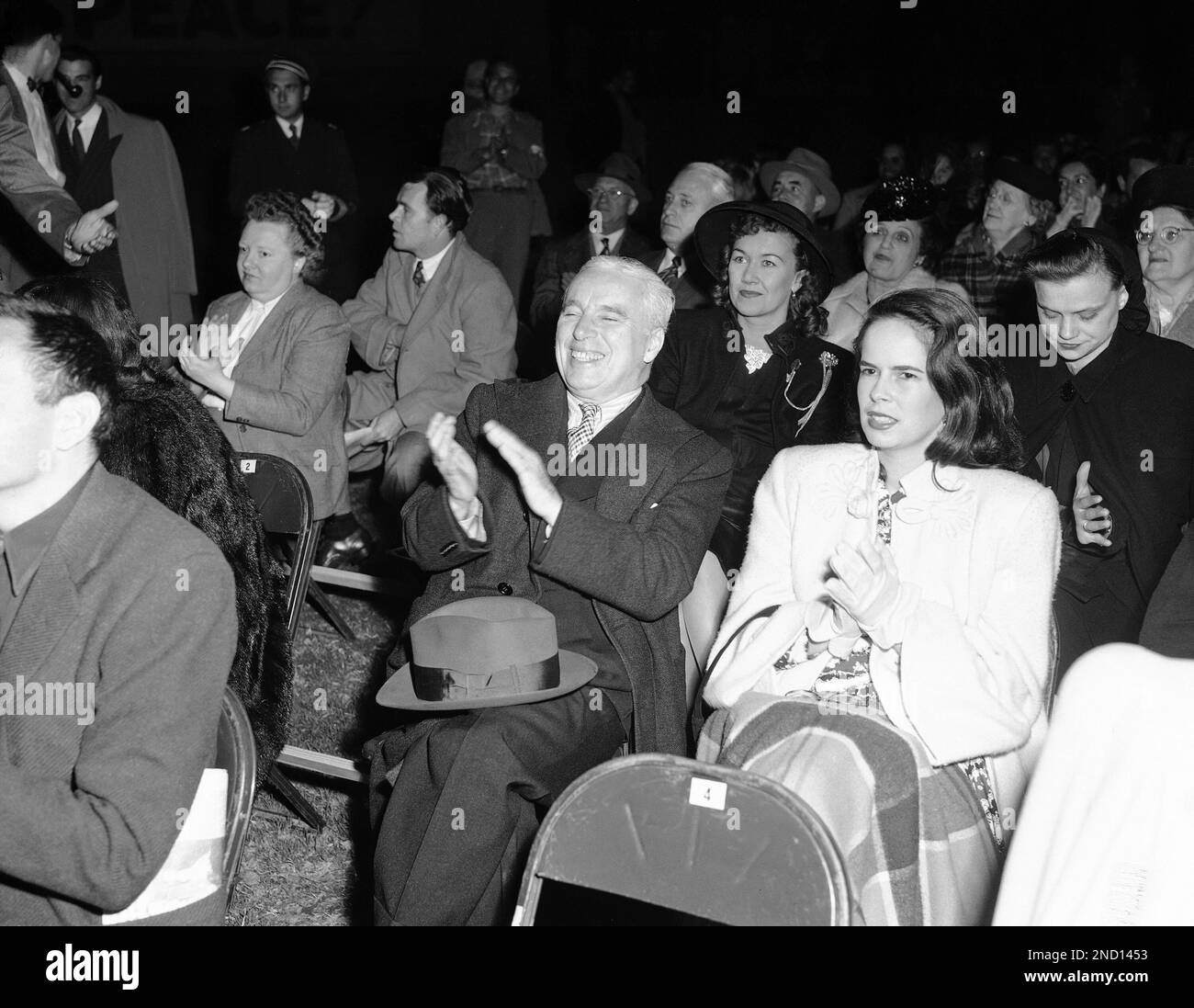 Actor Charlie Chaplin and his wife, the former Oona O’Neil, attend ...