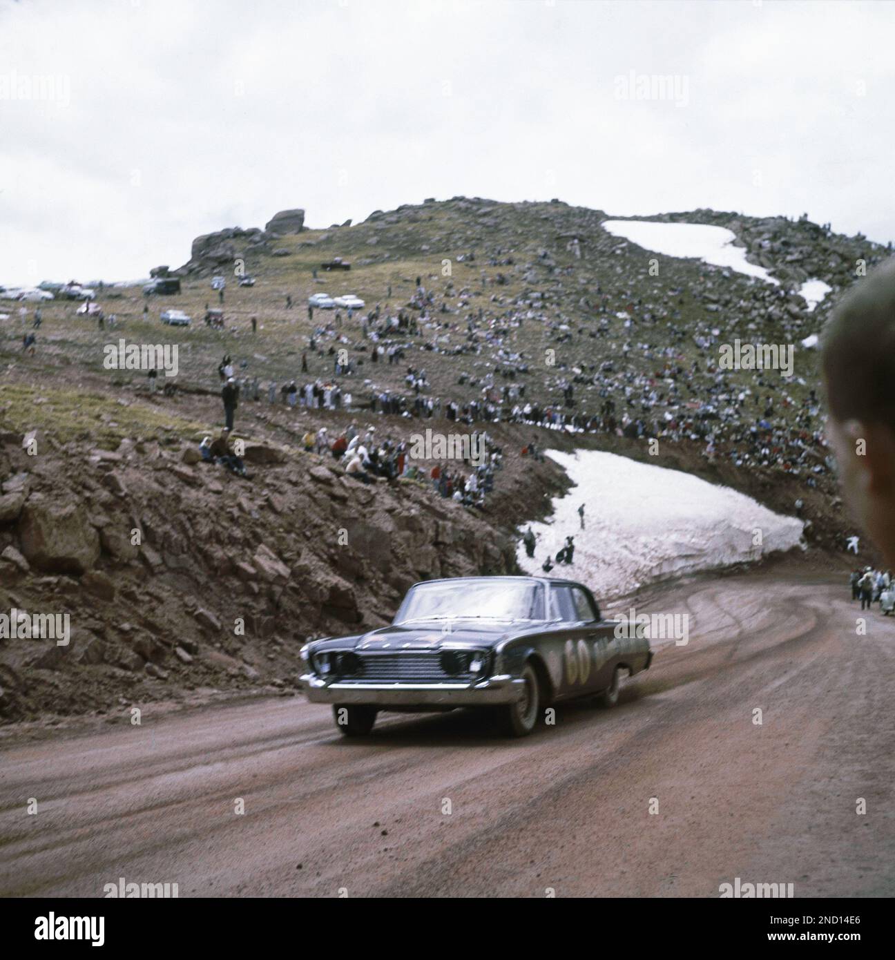 Unidentified cars making Pikes Peak hill climb during auto racing in ...