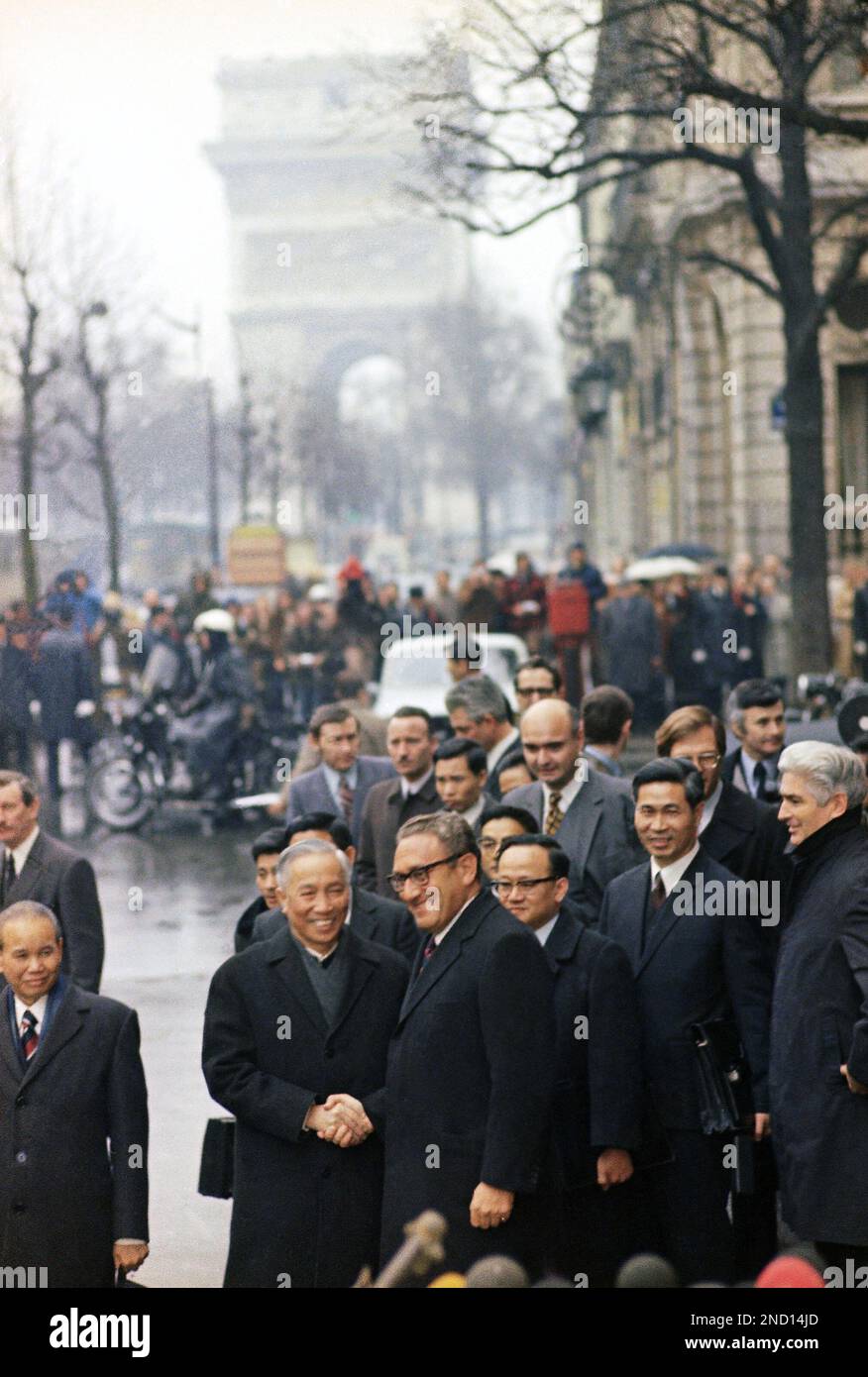 Henry Kissinger with Le Duc Tho in a chill Paris Street on April 21 ...