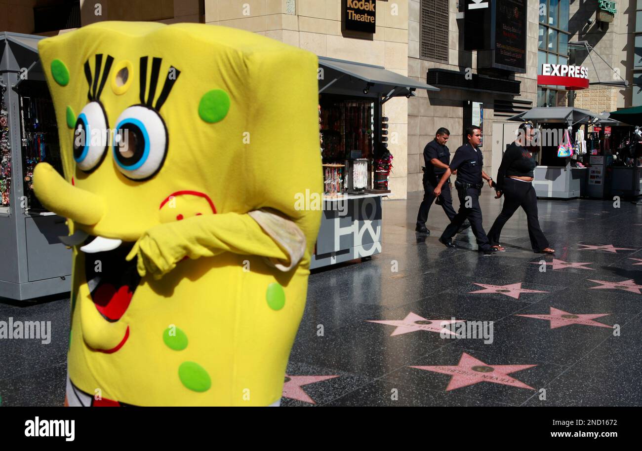 Bernard Golden, left, dressed as Spongebob Squarepants, entertains ...