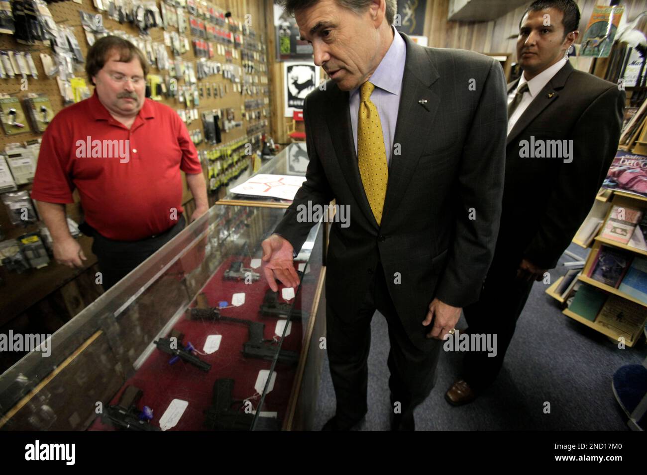 FILE - In this Sept. 16, 2010 file photo, Texas Gov. Rick Perry, center ...