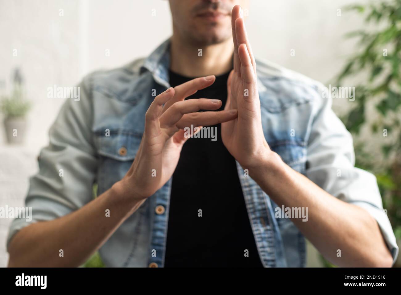 Man showing gesture in sign language on white background Stock Photo ...
